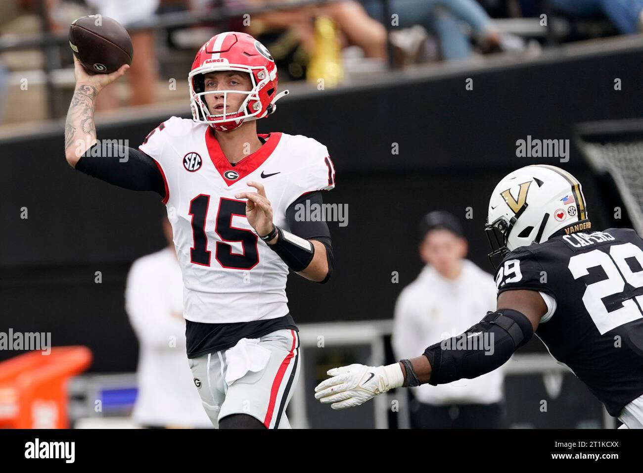 Georgia quarterback Carson Beck (15) looks to throw a pass past ...