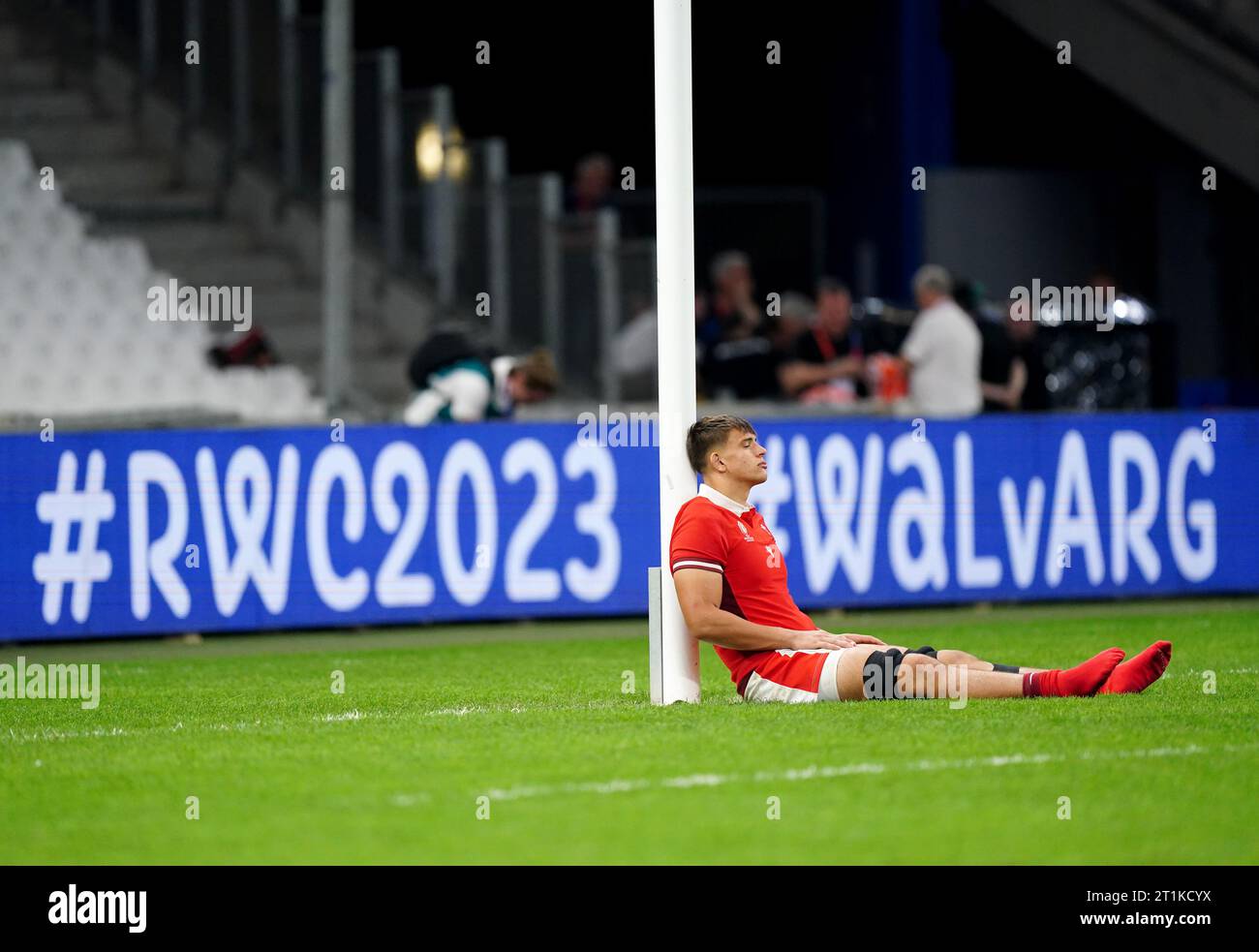 Wales' Dafydd Jenkins sits on the pitch after the Rugby World Cup 2023 ...
