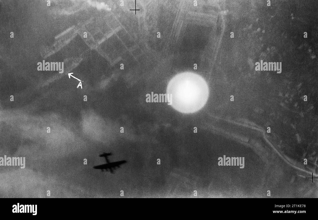 An Avro Lancaster silhouetted over the Italian port of La Spezia on the ...