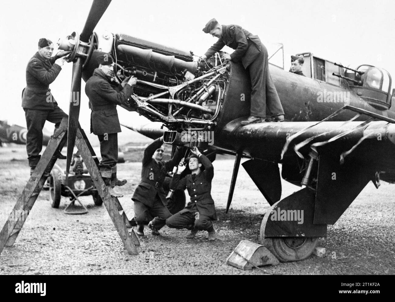 Fitters working on the Rolls-Royce Merlin engine of a Boulton Paul ...