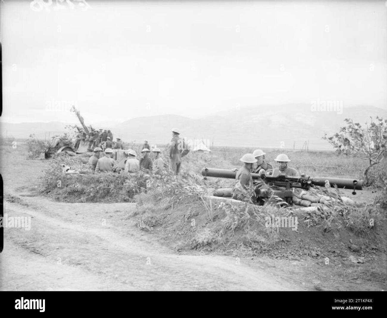 The British Army in Greece, 1940. Camouflaged anti-aircraft gun site in ...