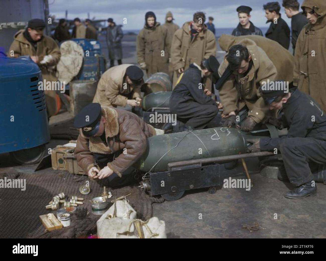 Fleet Air Arm personnel fusing bombs for Fairey Barracudas on the ...