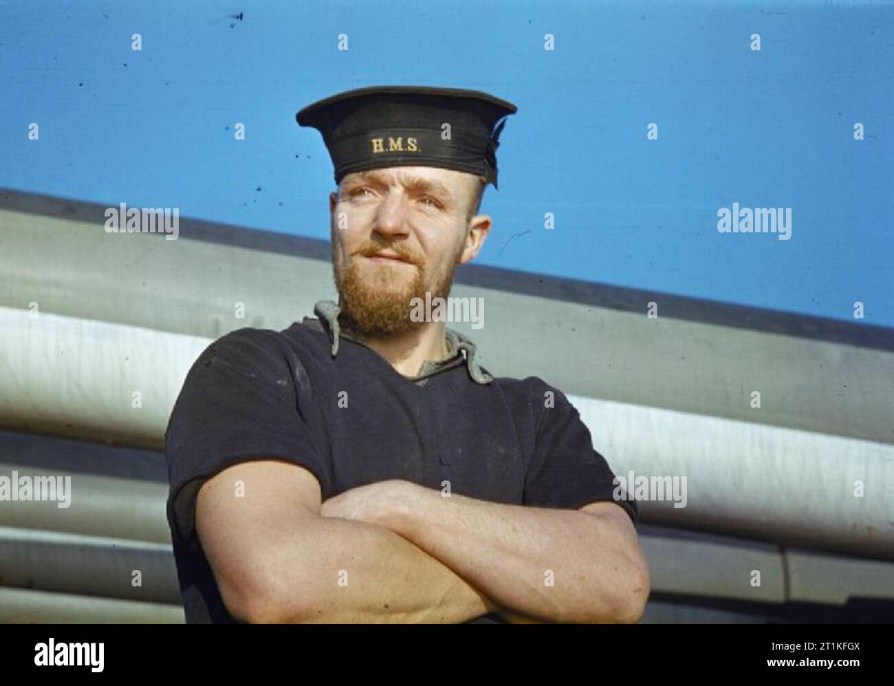 On Board a Battleship, November 1942 Half-length portrait of a bearded sailor on board a ...