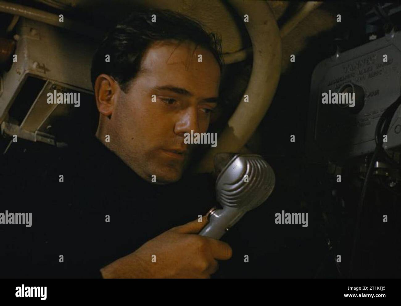 On Board Hm Submarine Tribune, 1942 An actor with the tannoy on board ...