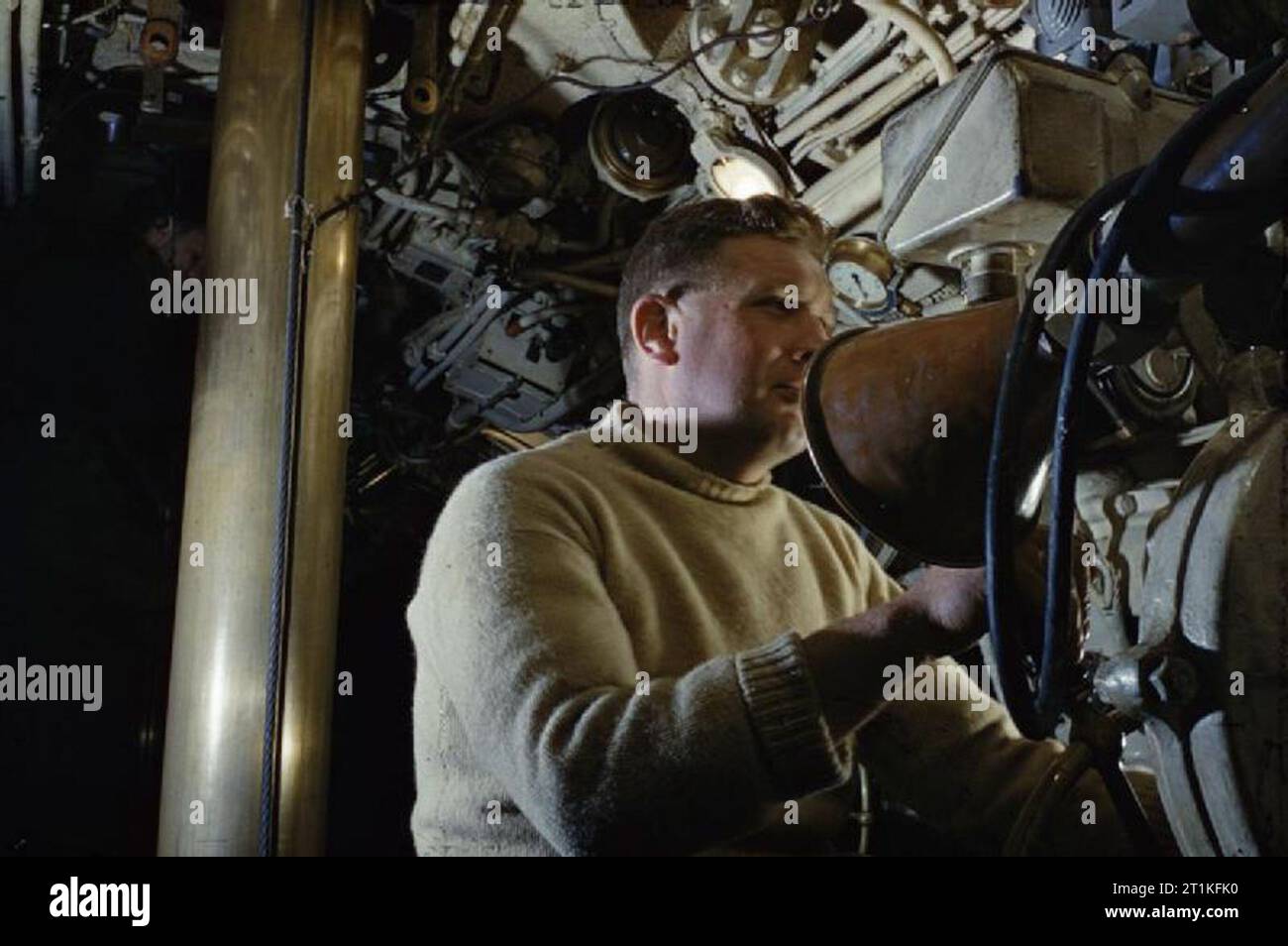 On Board Hm Submarine Tribune, 1942 Submariner at the steering wheel of ...