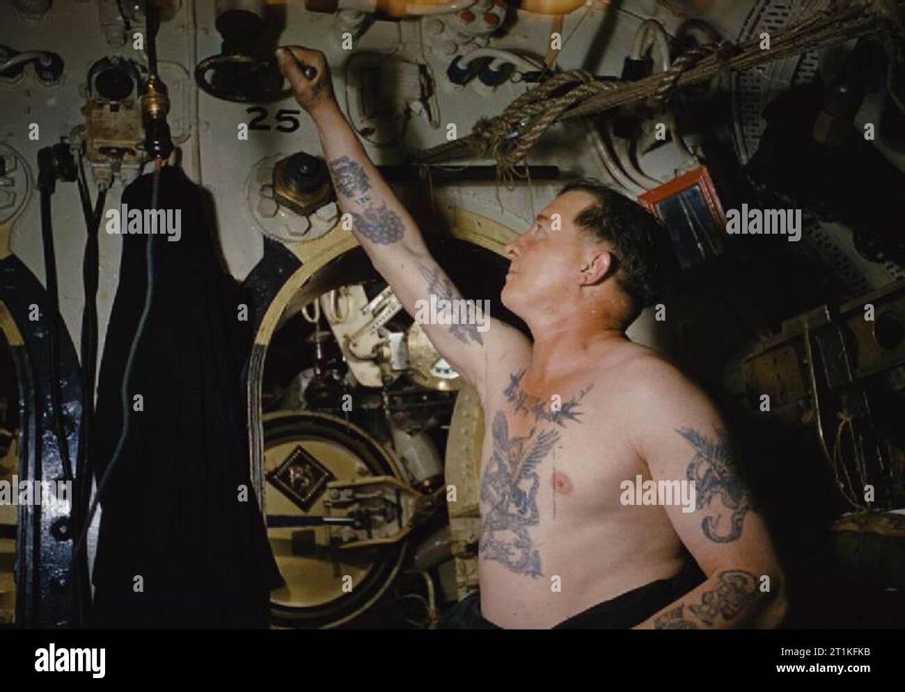On Board Hm Submarine Tribune, 1942 An actor operating a high pressure ...