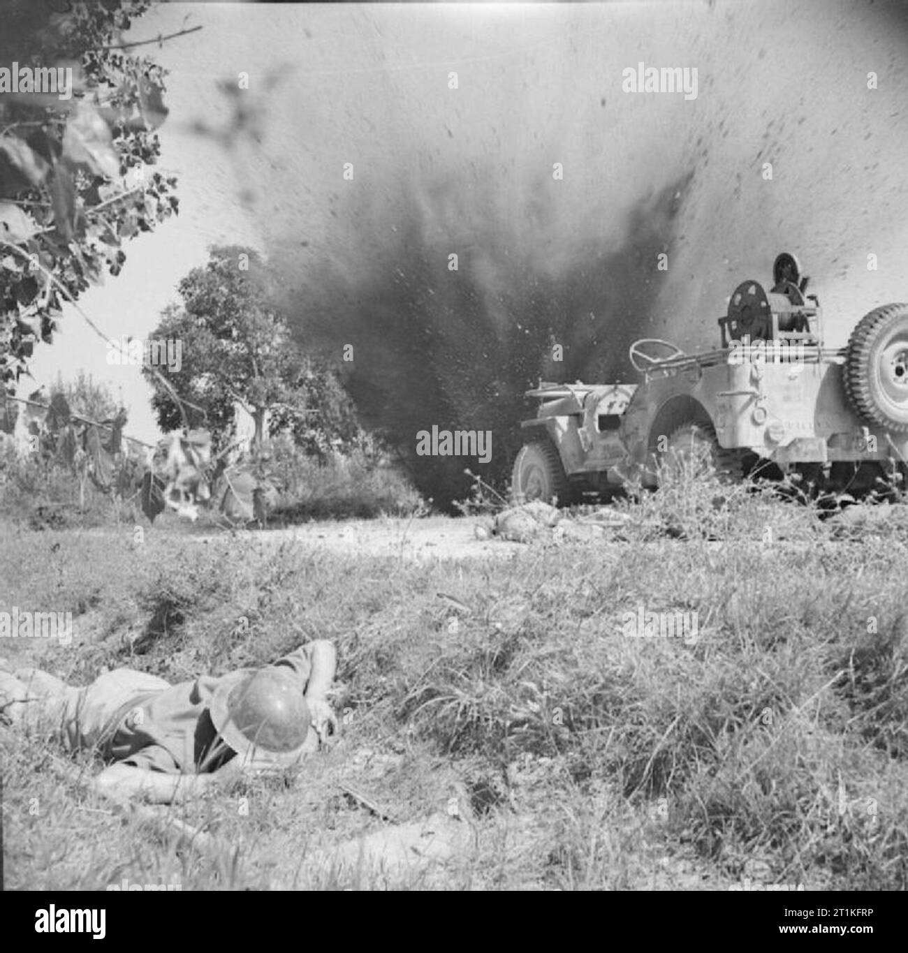The British Army in Italy 1943 Signallers take cover in a ditch as an ...