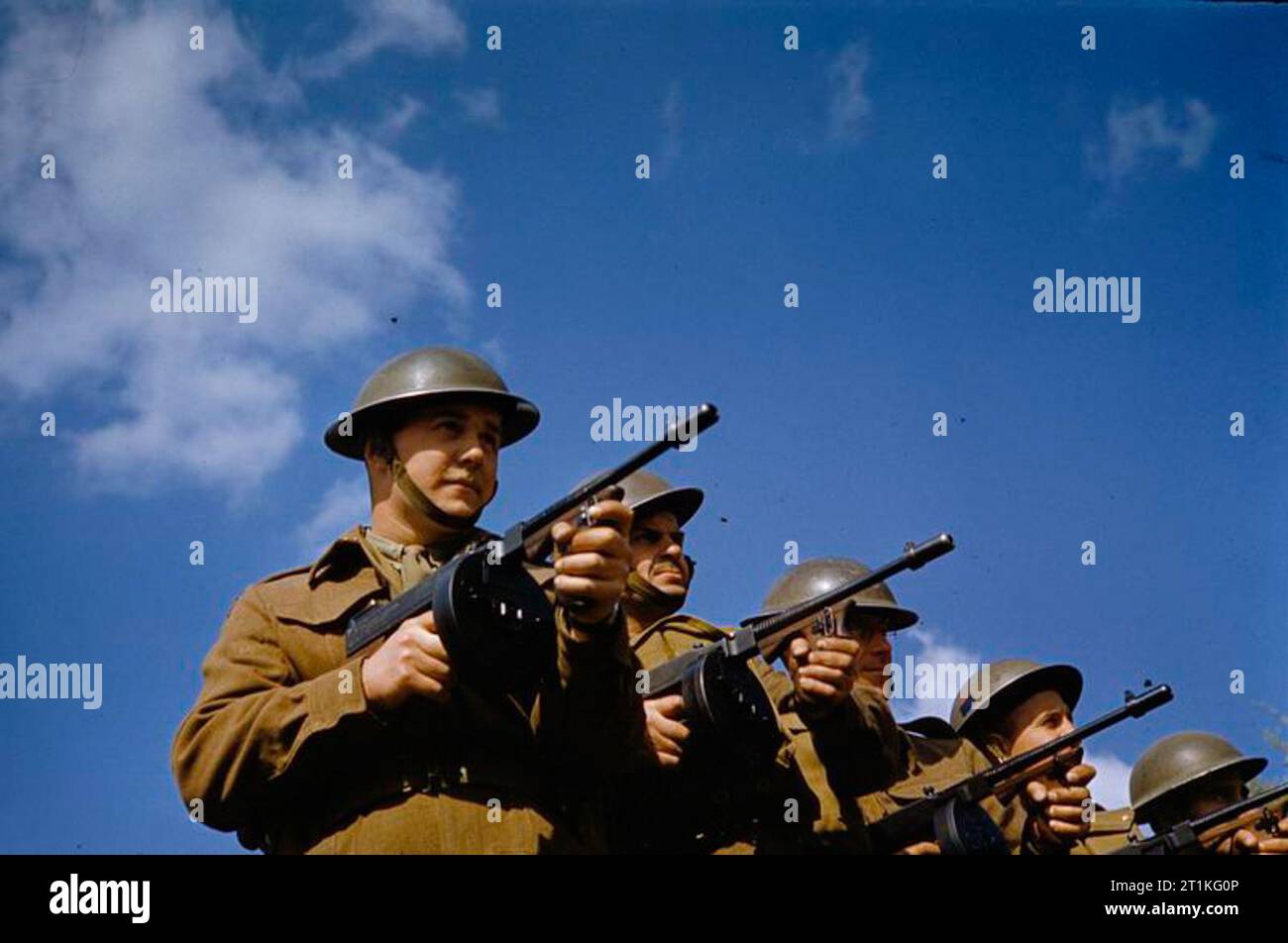 Canadian Troops in England, 1942 Canadian troops wearing tin helmets ...