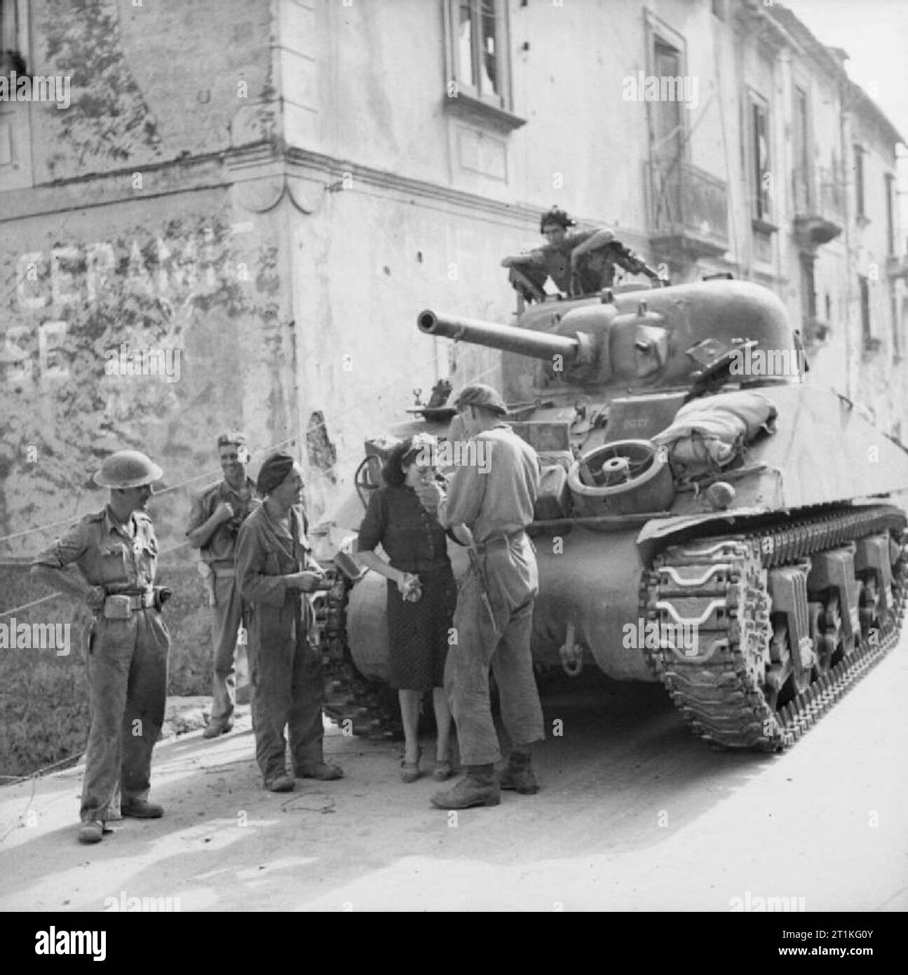 The British Army in Italy 1943 A Sherman tank crew with a local Italian ...