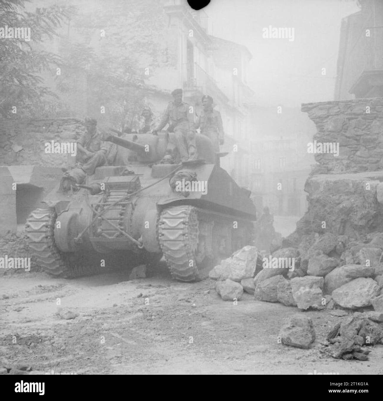 The British Army in Italy 1943 A Sherman tank passes through Nicastro ...