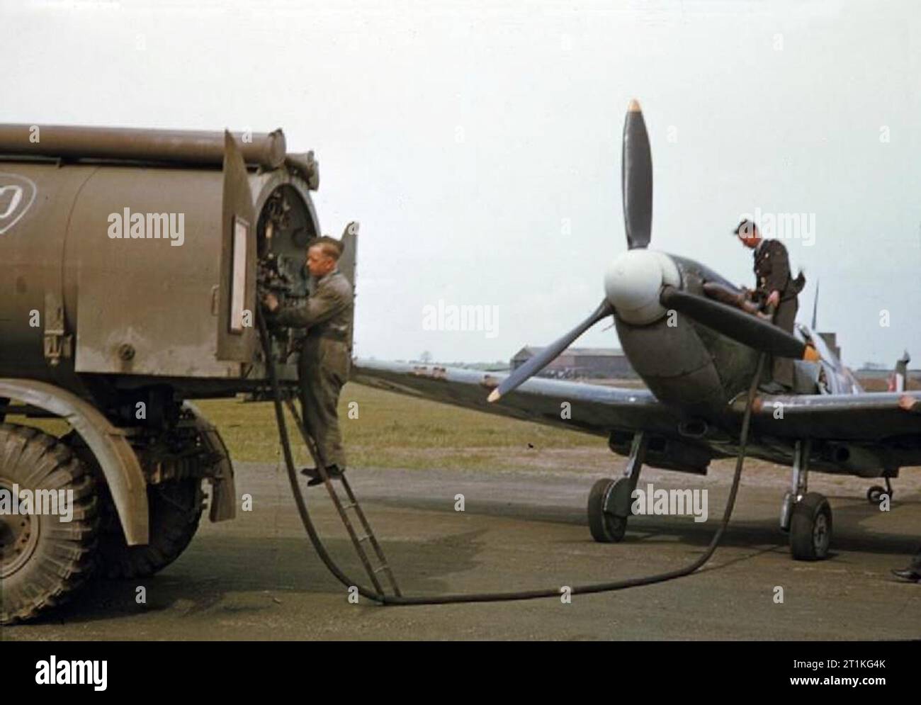 Royal Air Force ground crewmen refuelling a Supermarine Spitfire Mark ...