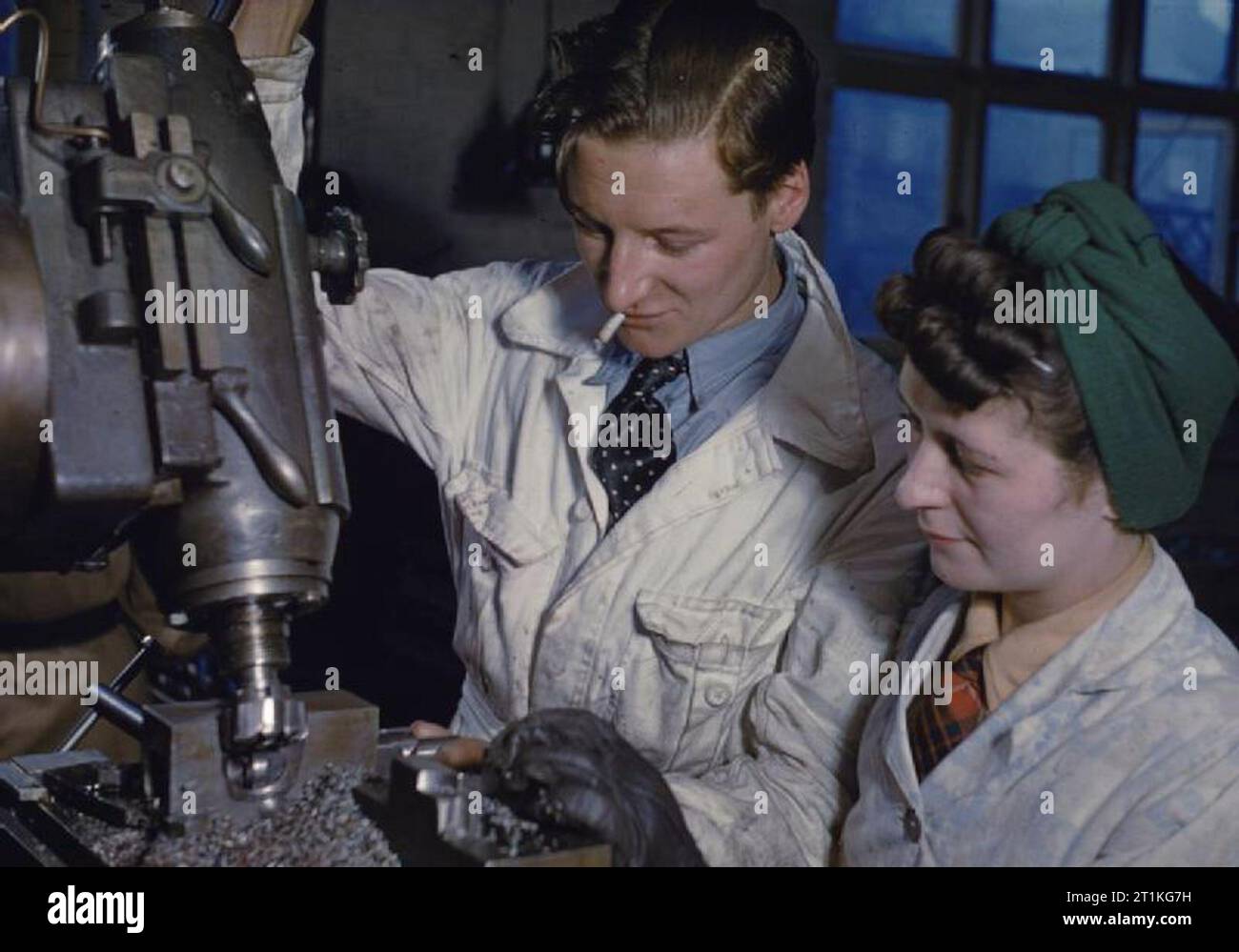Sten Gun Production in Britain, 1943 Woman war worker being taught how ...