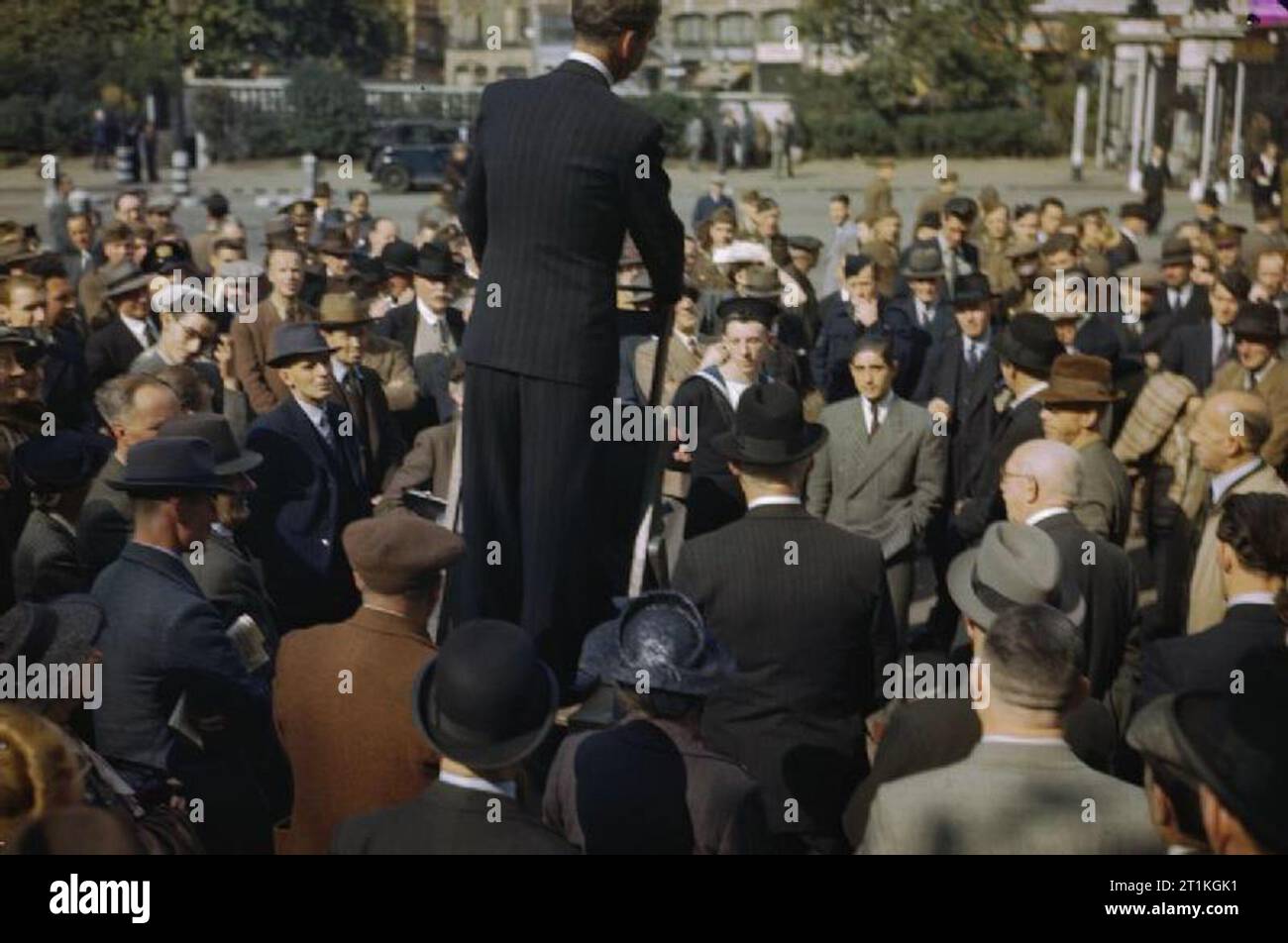 The Home Front in Britain, 1944 A crowd of civilians and servicemen ...