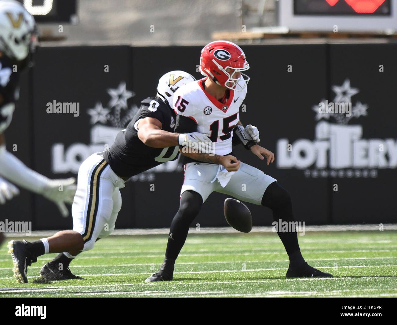 NASHVILLE, TN - OCTOBER 14: Georgia Bulldogs Quarterback Carson Beck (15) fumbles the ball as he ...