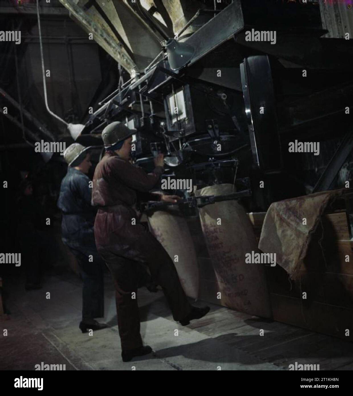 Women War Workers in Britain, 1944 Two women weighing and packing ...