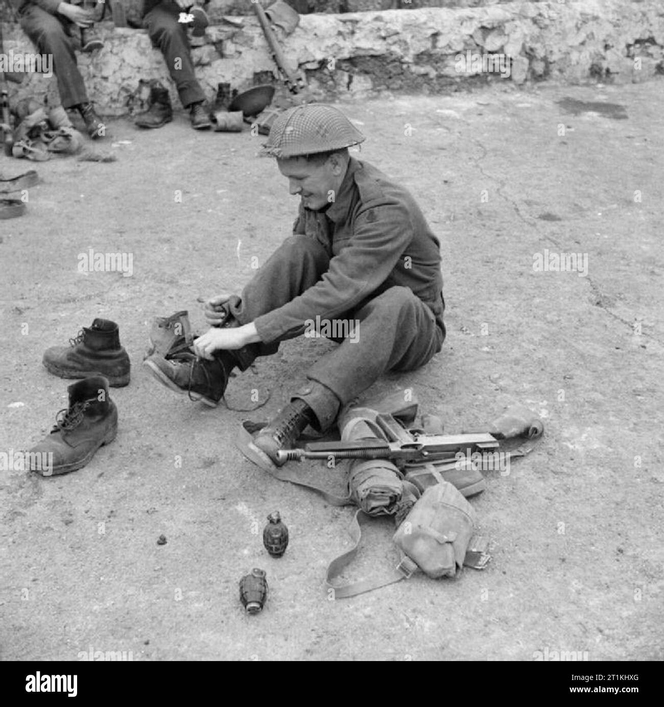 The British Army in Italy 1944 Corporal A Mulholland changes into ...