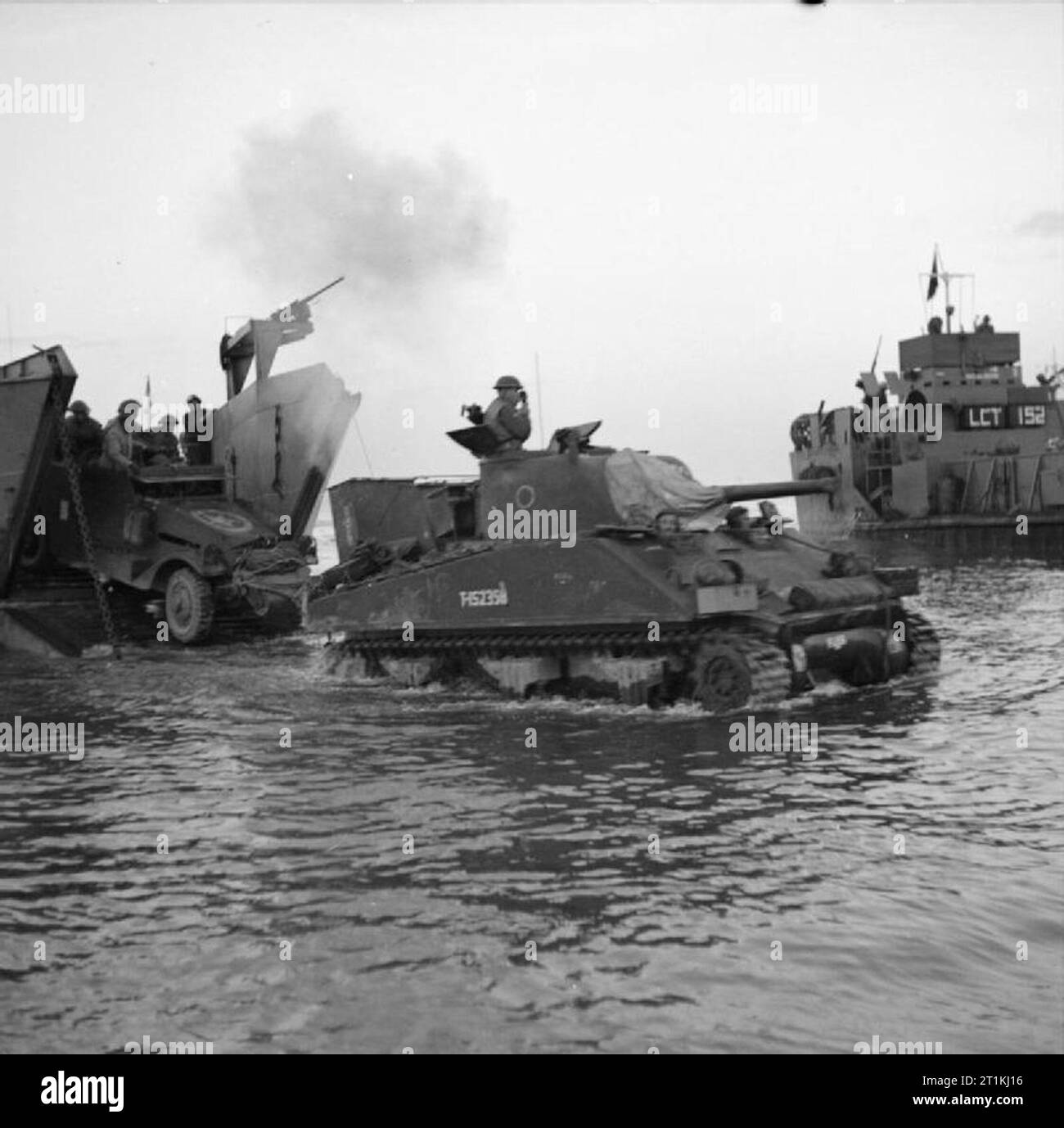 The British Army in Italy 1944 A Sherman tank comes ashore from a ...