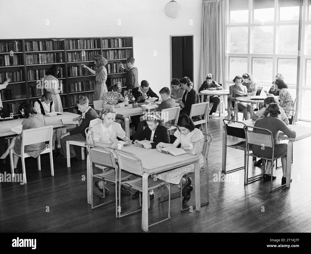 Children Make Use Of The Library In A Newly Constructed County School
