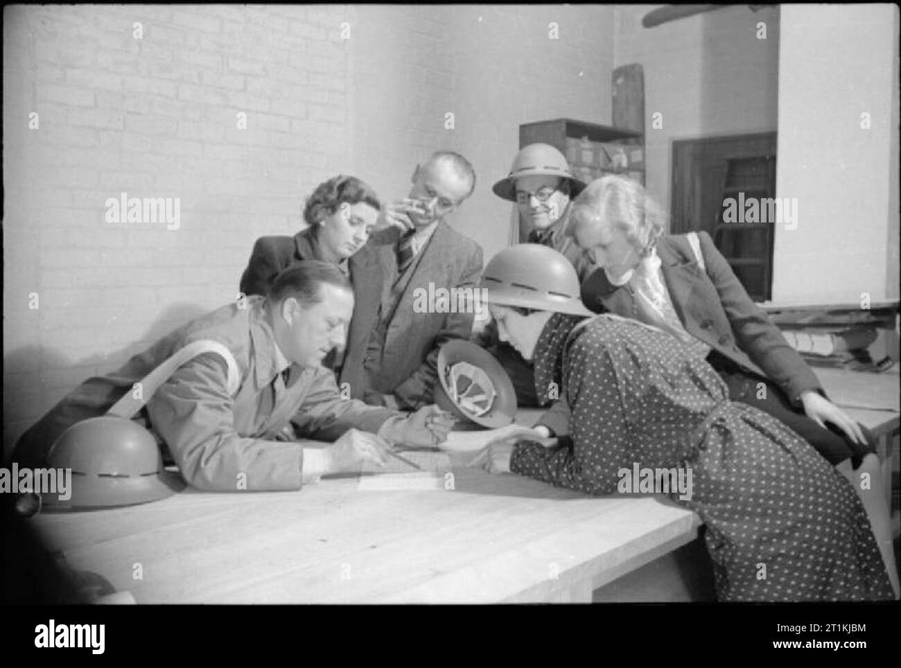 Civilian Firefighters at Work, England, UK, 1941 A group of civilian ...