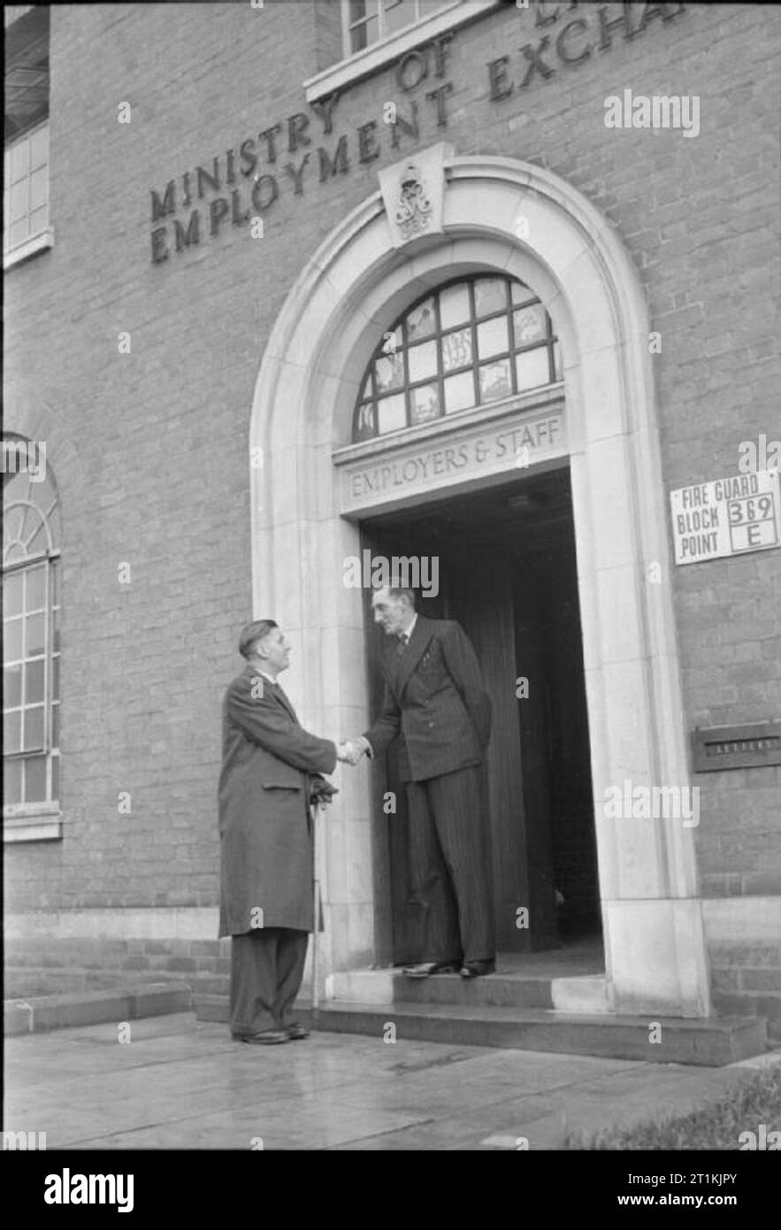 Doorstep interview Black and White Stock Photos & Images - Alamy