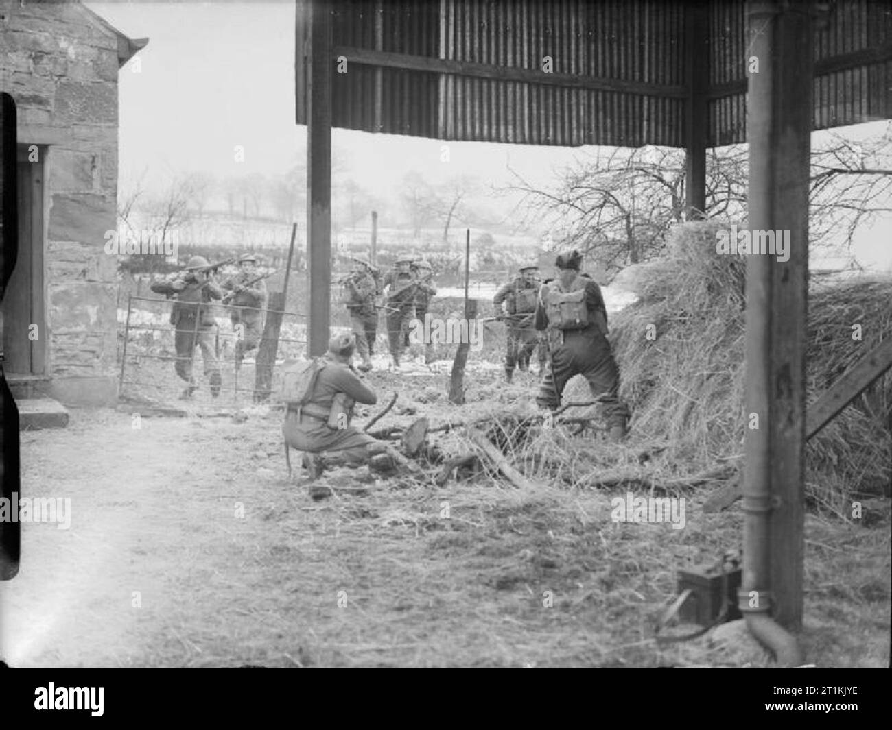 Dutch Troops Train in England, 1941 A group of Dutch troops defend a ...