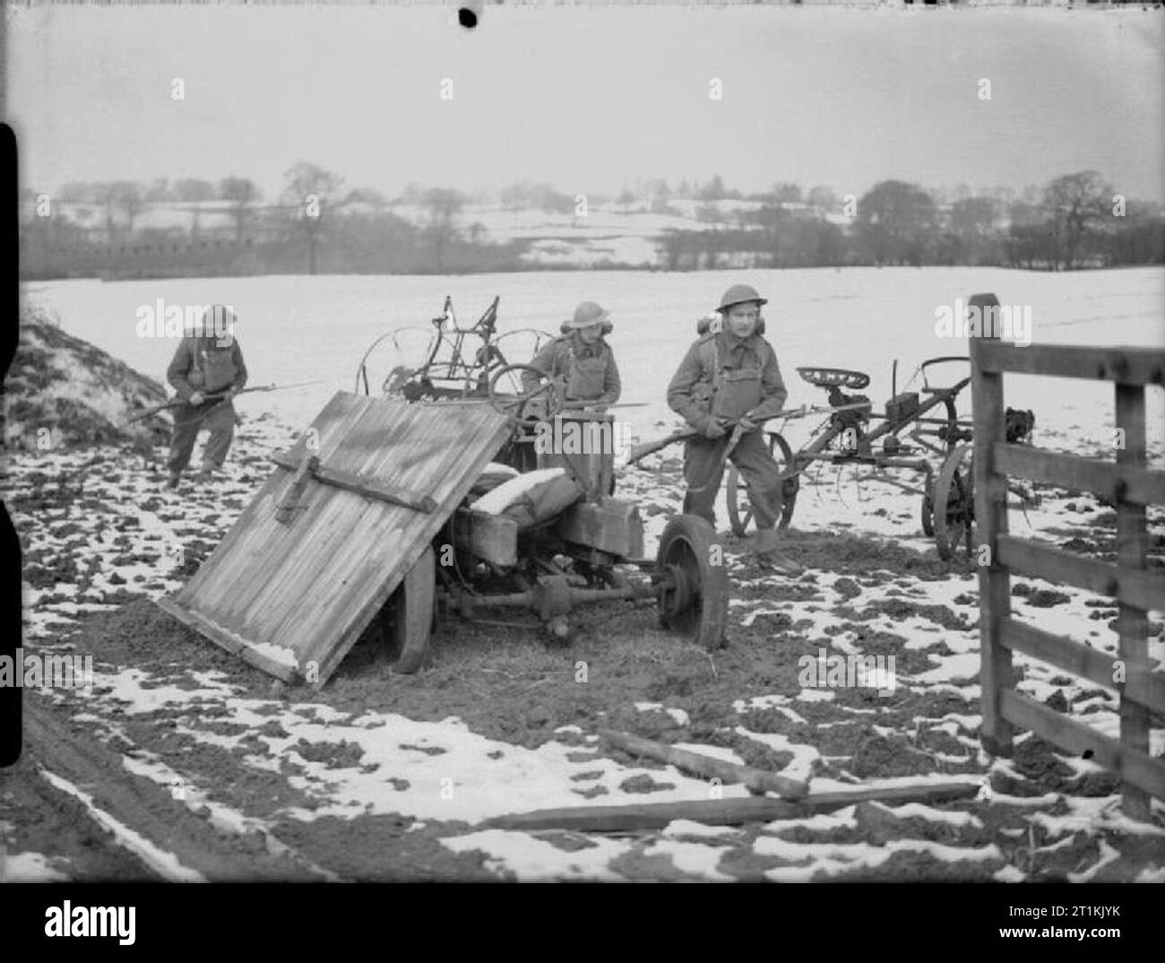 Dutch Troops Train in England, 1941 Three Dutch soldiers creep past ...