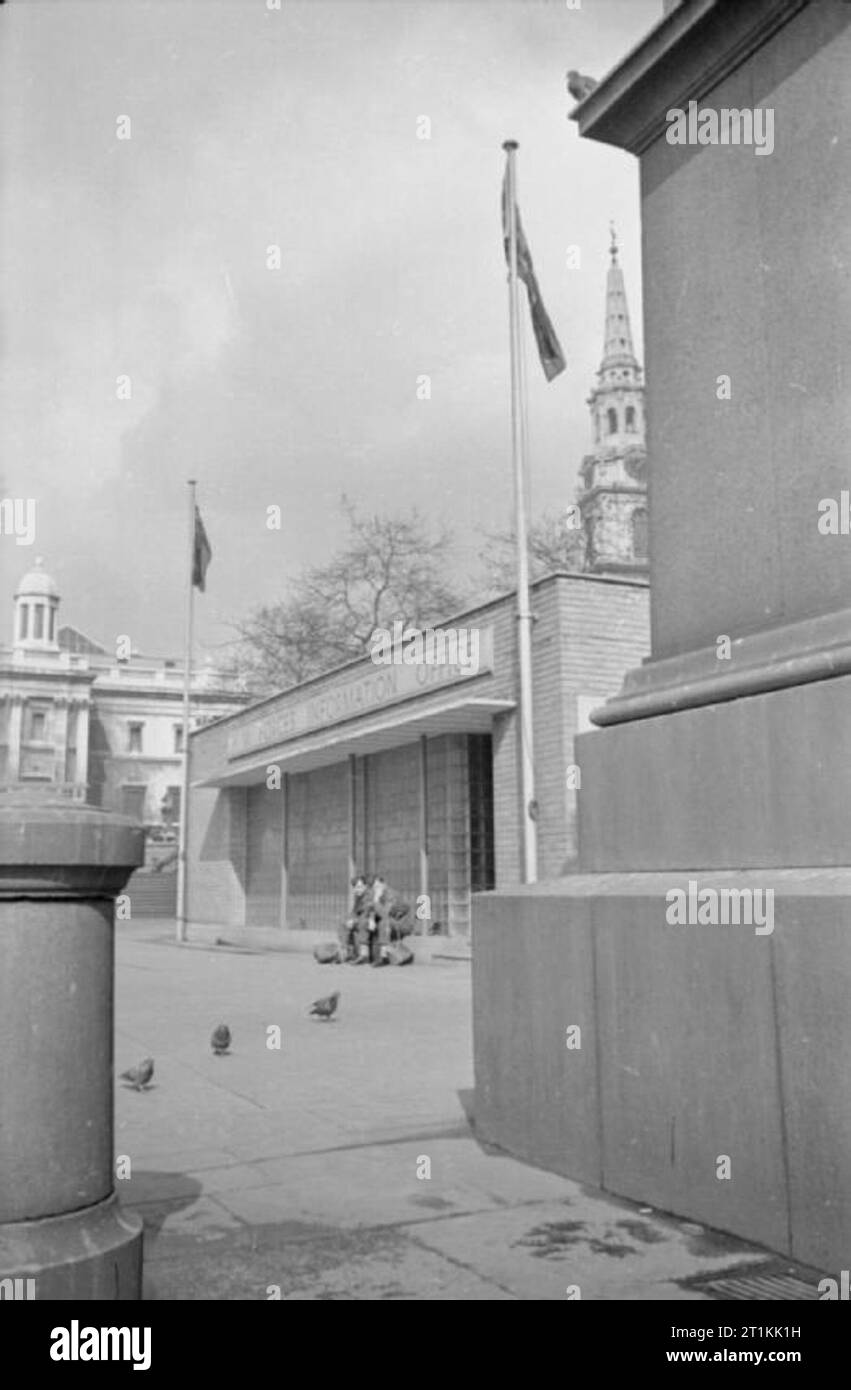 Everyday Life in Trafalgar Square, London, England, 1941 Two men of the ...