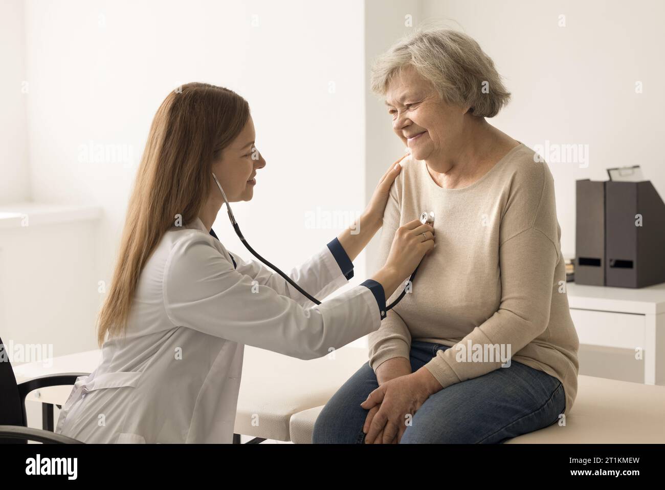 Elderly woman passes health check up during visit in clinic Stock Photo ...