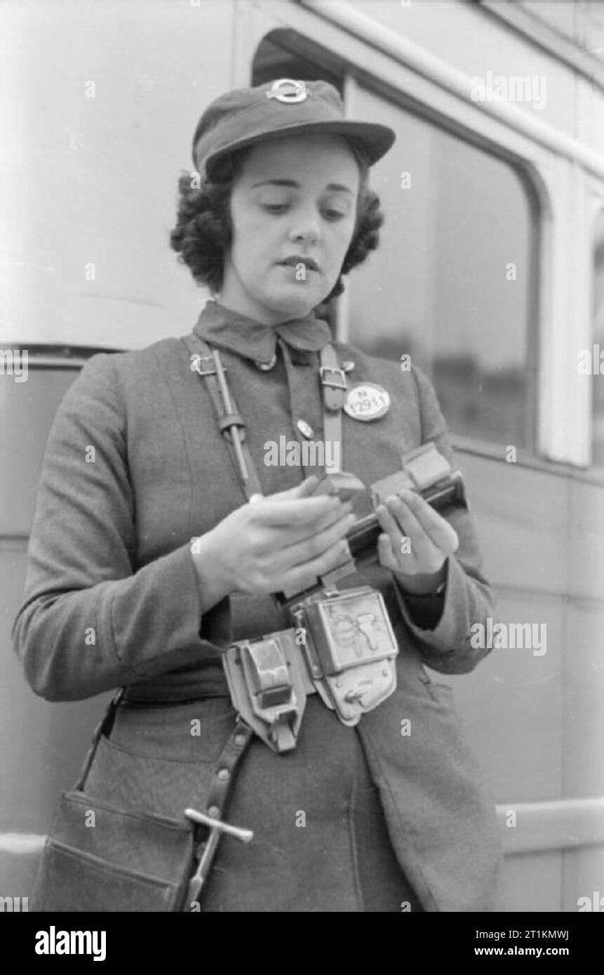 London Buses in Wartime, England, 1941 London bus conductor Lilian ...