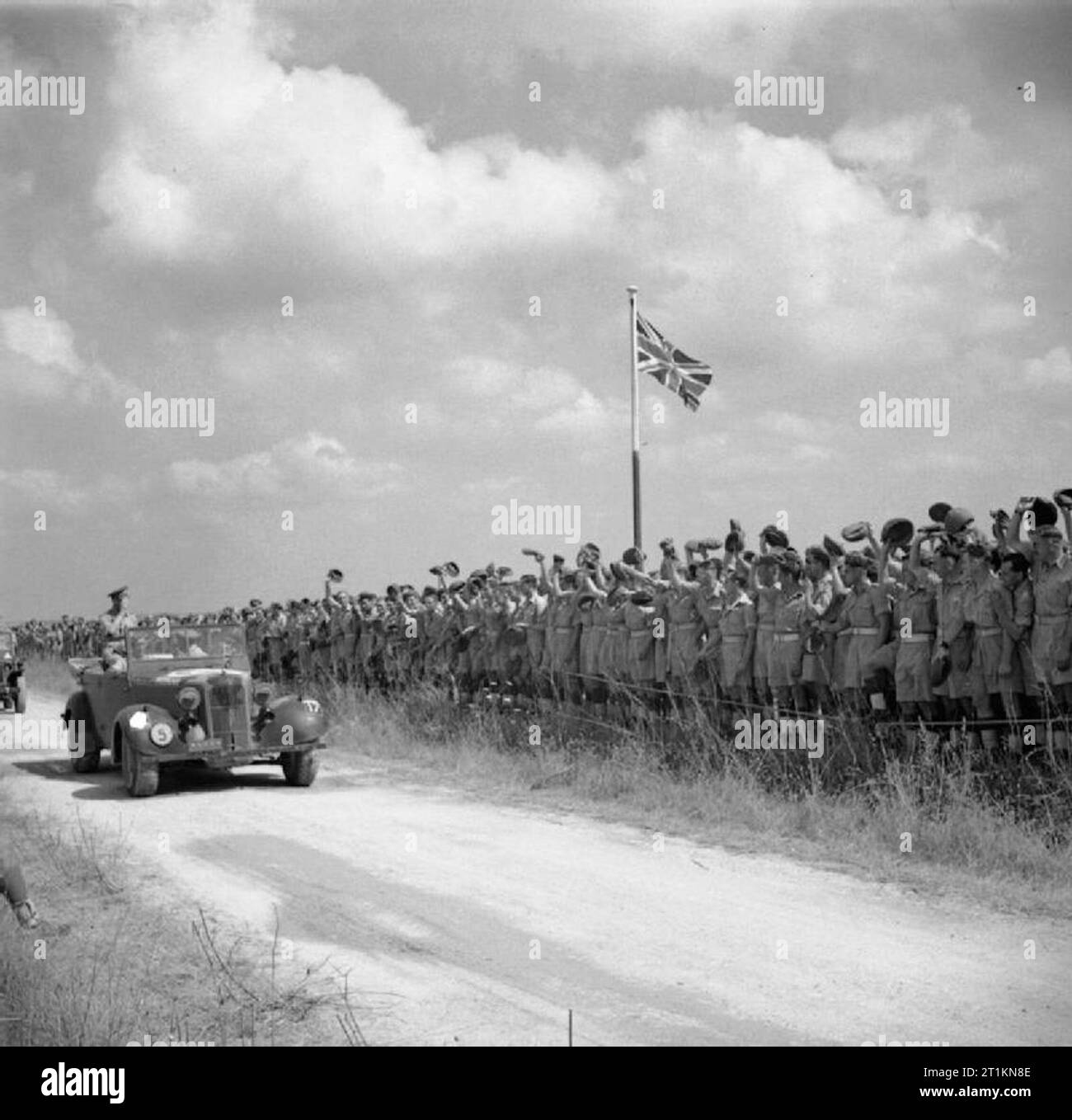 The British Army in Italy 1944 King George VI is driven past cheering ...