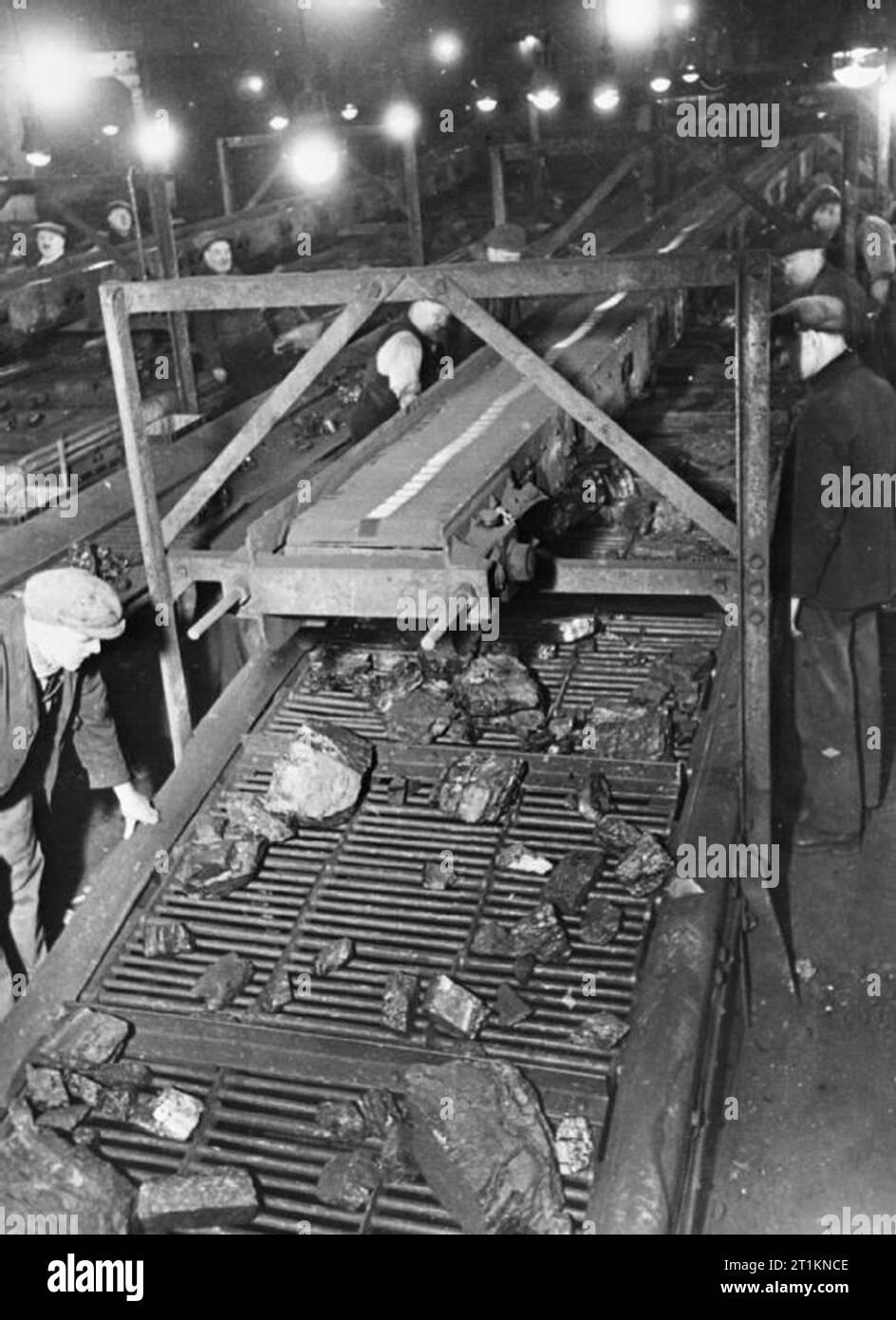 Men of the Mine- Life at the Coal Face, Britain, 1942 Chunks of coal ...