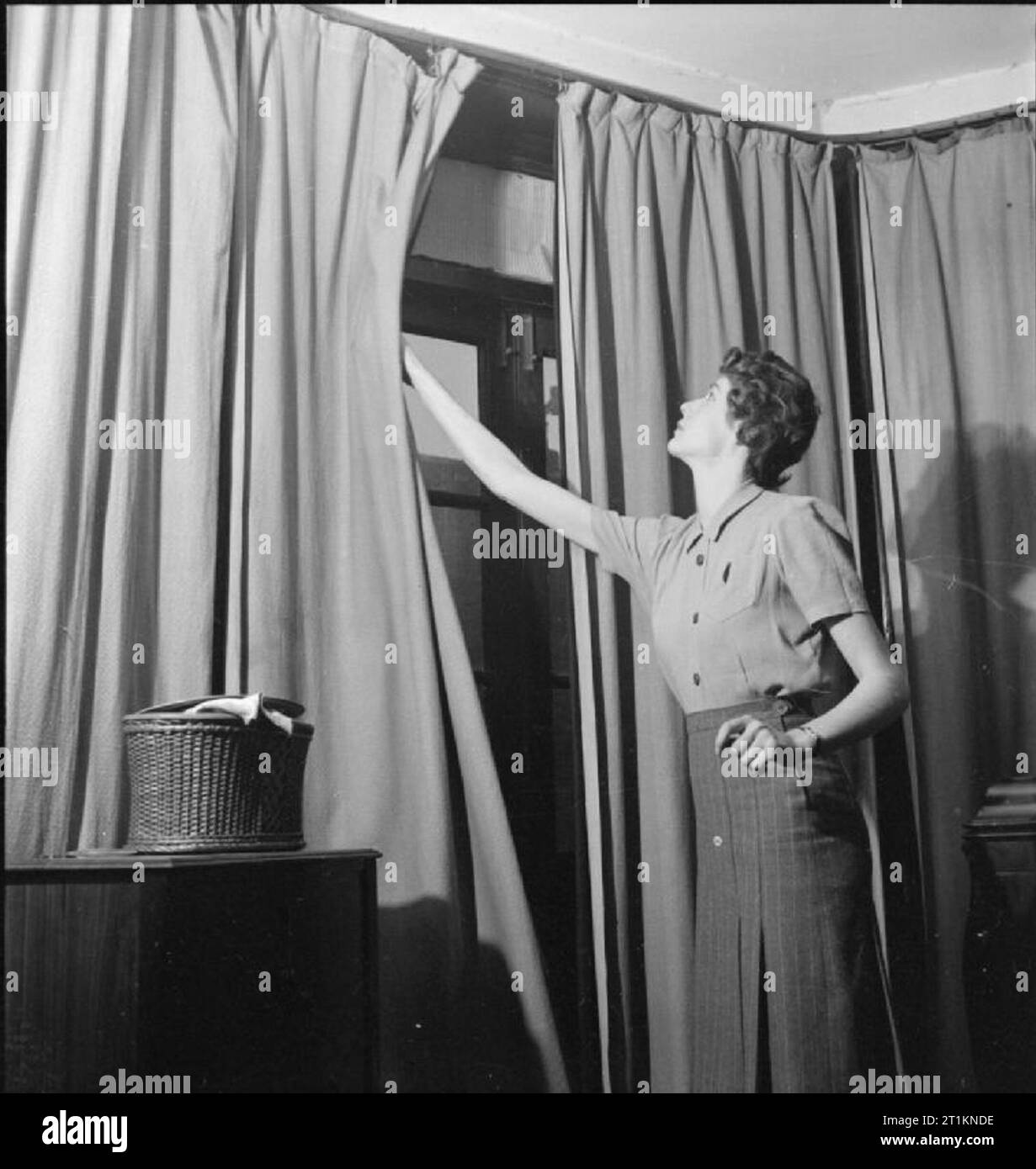 Air Raid Precautions and Civil Defence in Wartime Britain, 1942 A woman ...