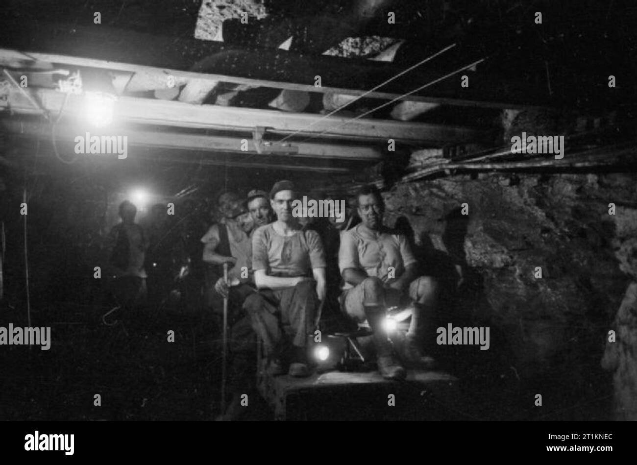 Men of the Mine- Life at the Coal Face, Britain, 1942 Coal miners sit ...