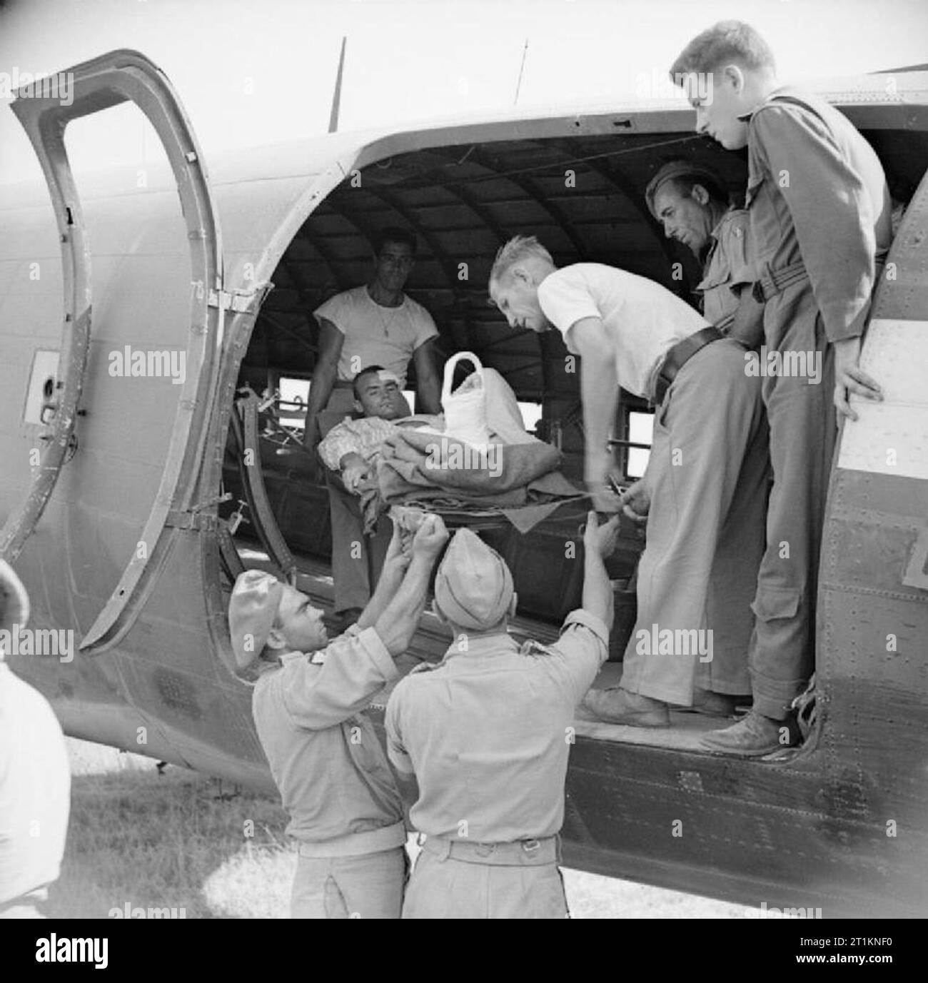 The British Army in Italy 1944 A casualty on a stretcher is loaded into ...