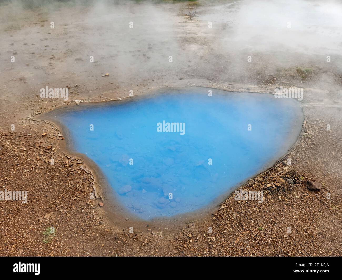 Clear blue hot spring and pool in Geysir geothermal area on Golden ...