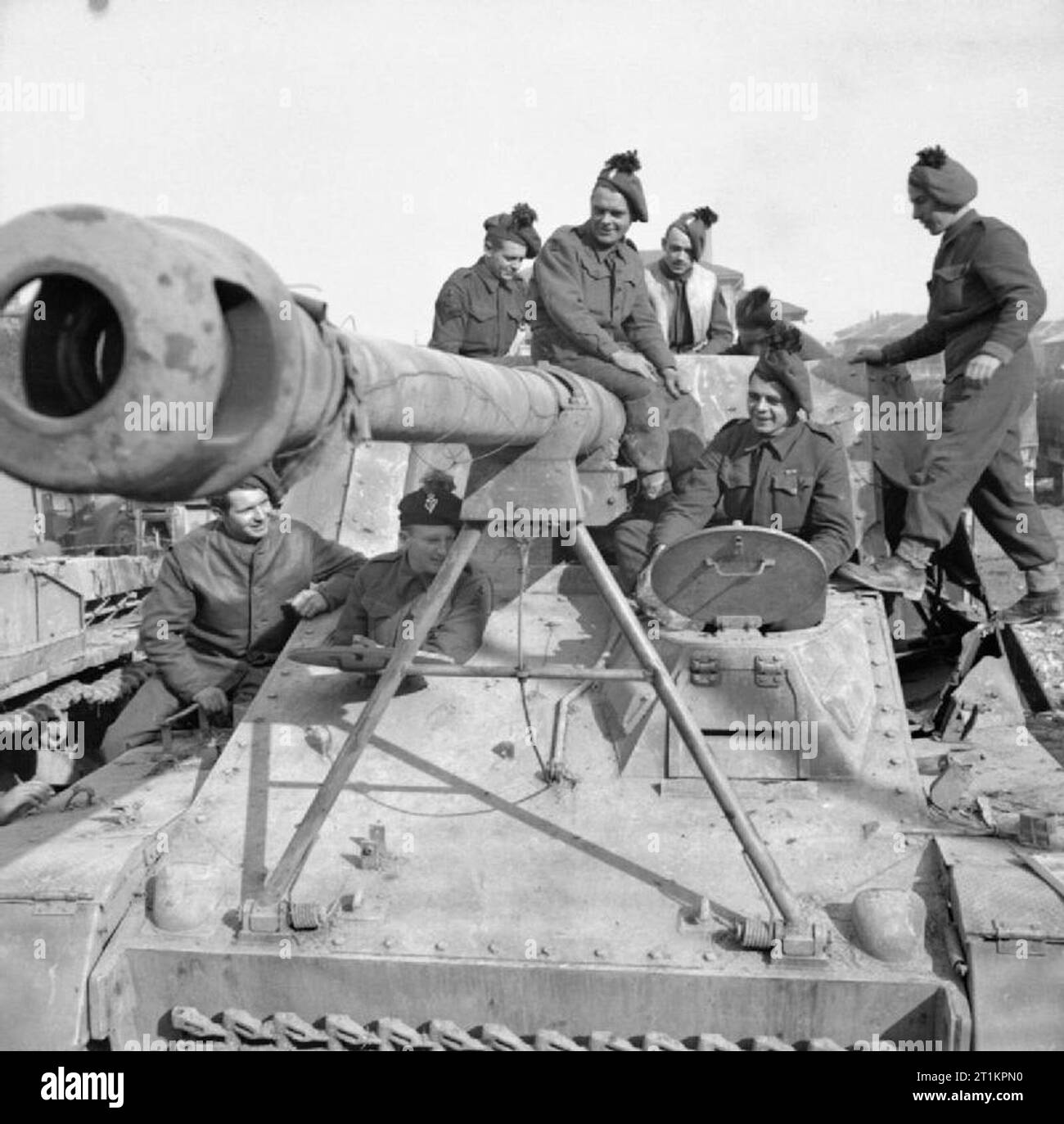The British Army in Italy 1945 Troops clamber over a captured German ...