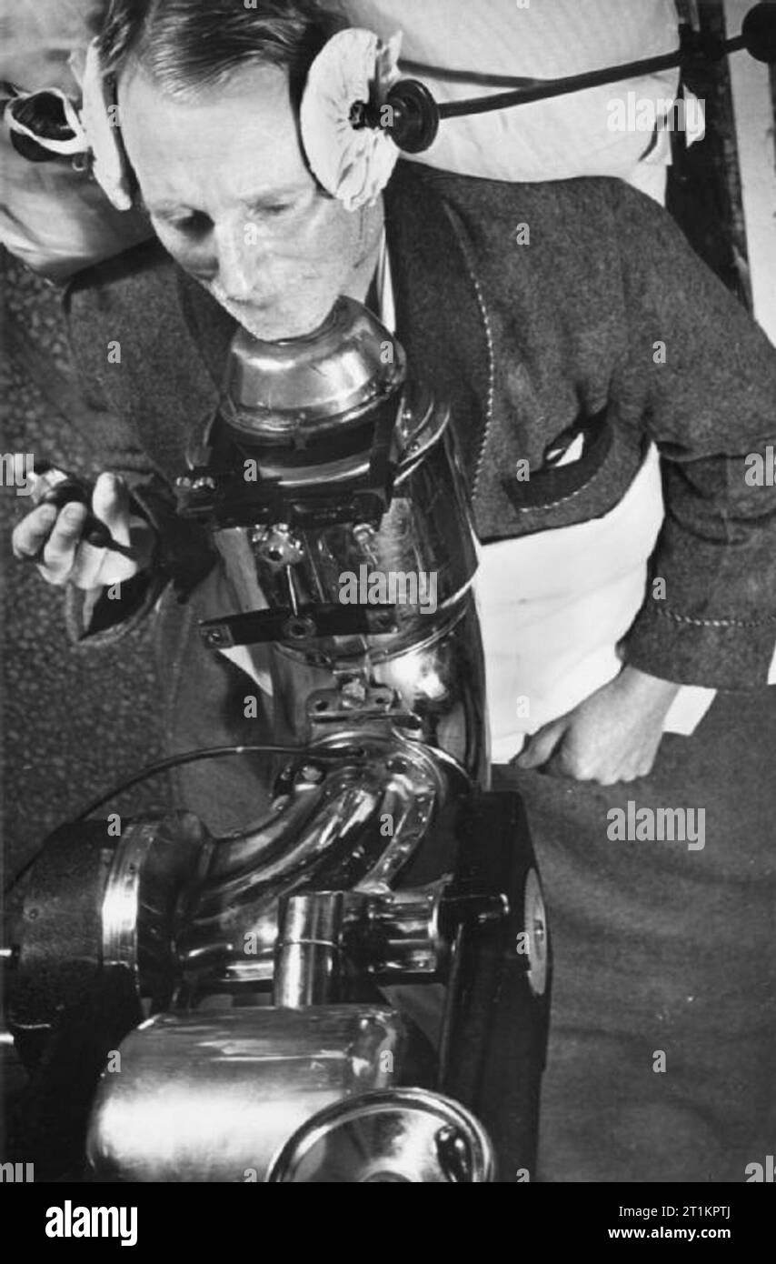 Radium Treatment in a London Hospital, England, 1940 The patient is ...