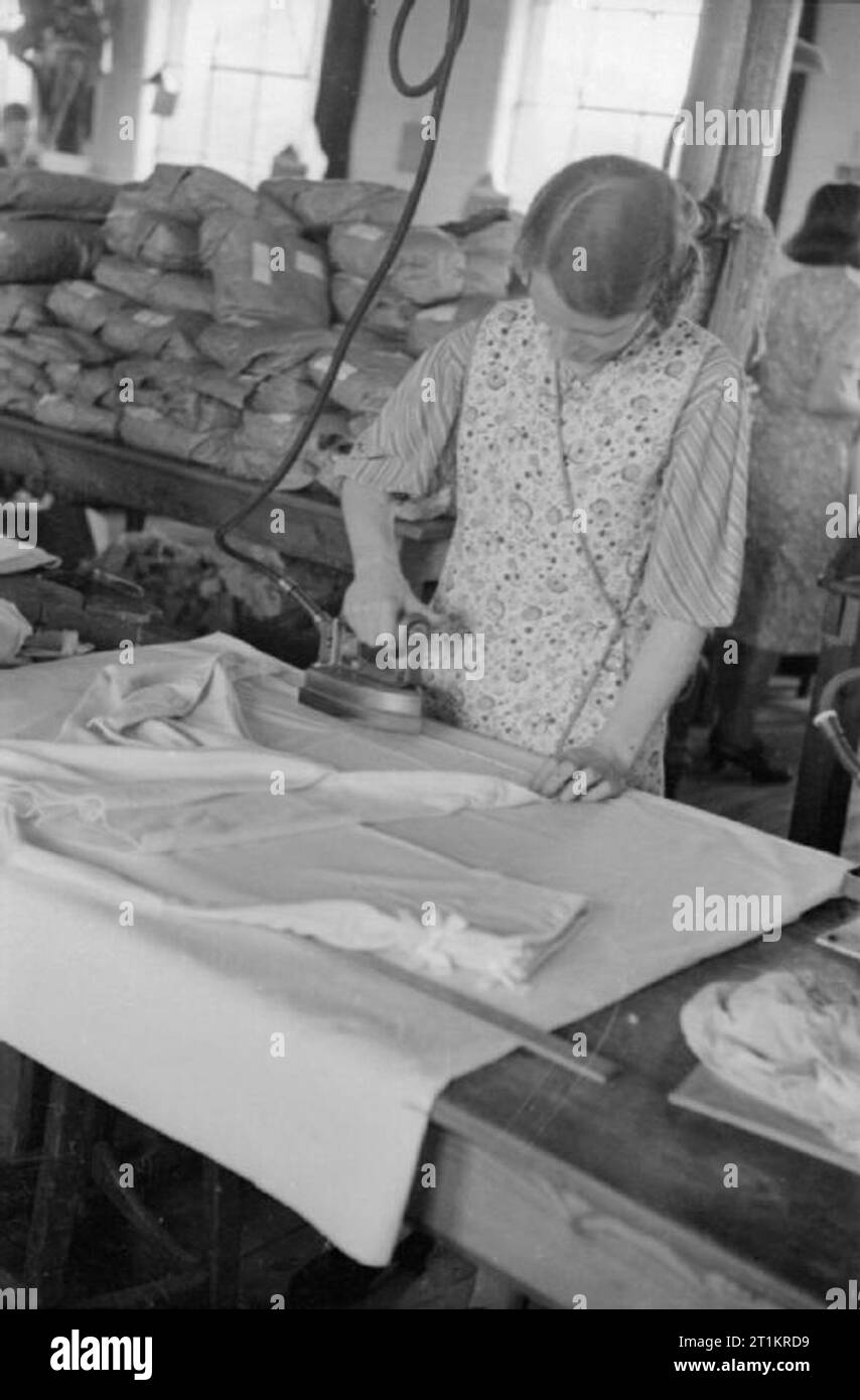 Stocking Manufacture in Nottinghamshire, England, 1940 A female worker ...