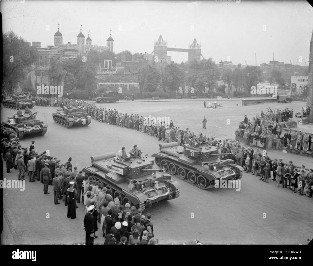 The London Victory Parade Crowds line the route as Cromwell, and behind ...