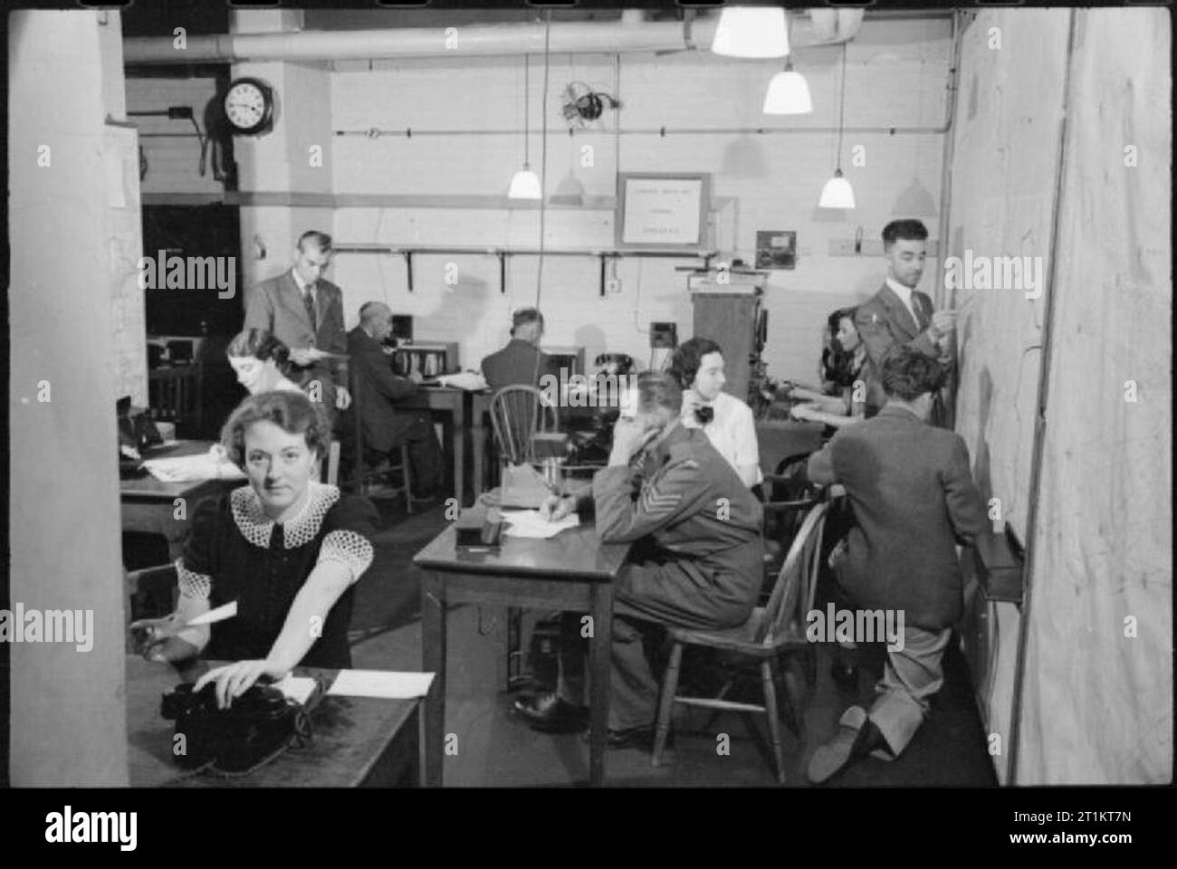 The Telephone Service Carries On, London, January 1942 A view of men ...
