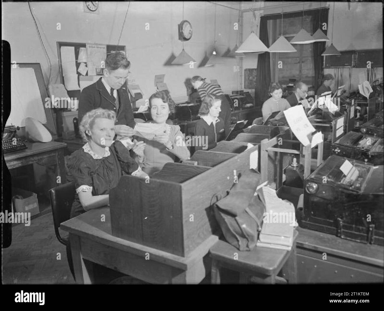 The work of the General Post Office, London, October 1941 Staff at work in the GPO teleprinter ...