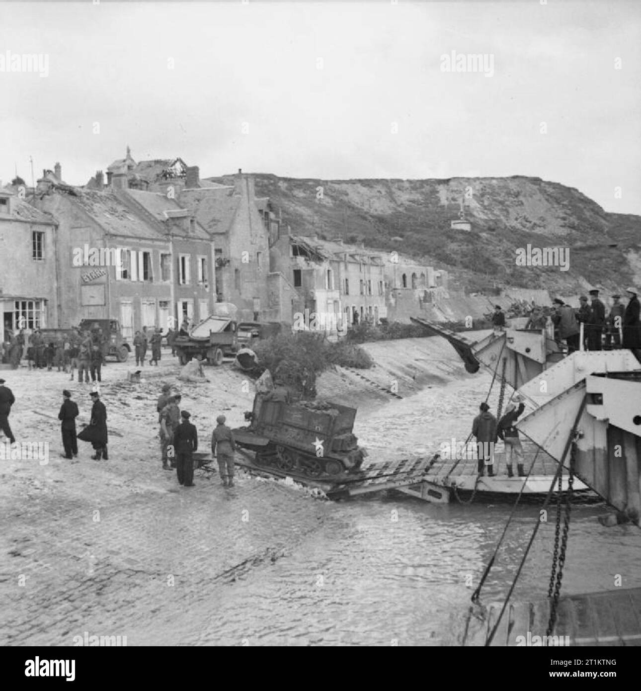 The British Army in Normandy 1944 A Universal carrier drives ashore off ...
