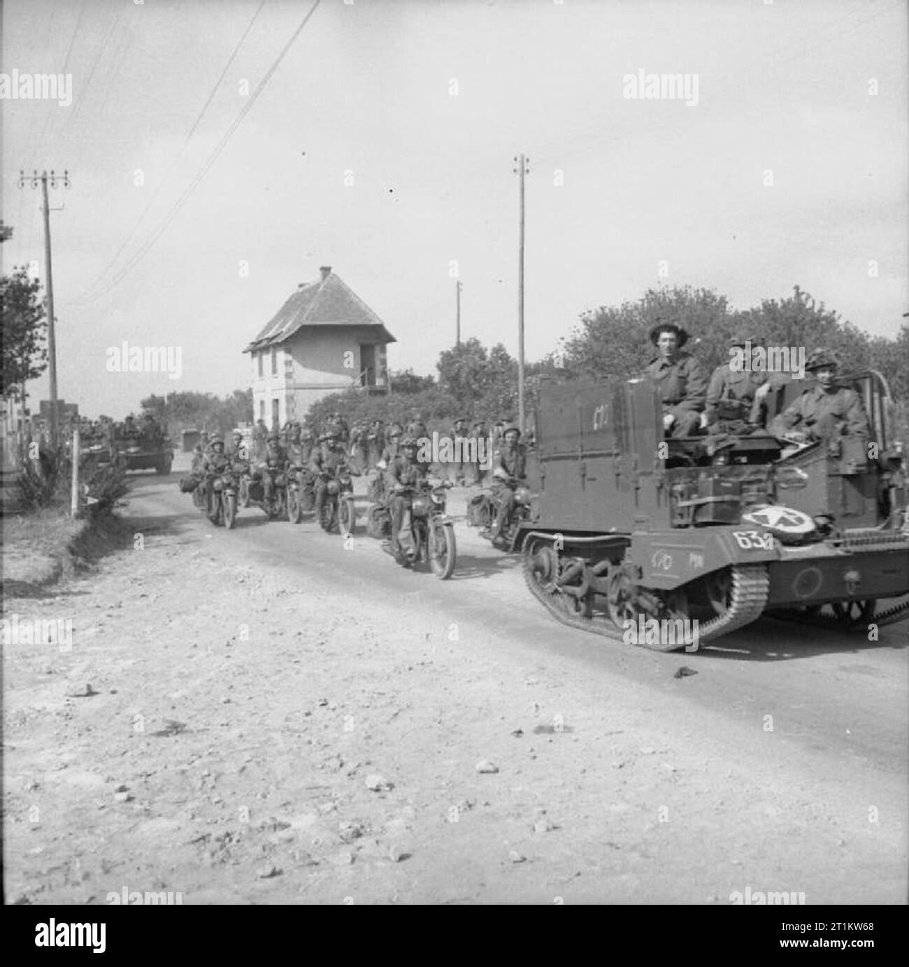 The British Army in Normandy 1944 Universal carriers and motorcycles ...
