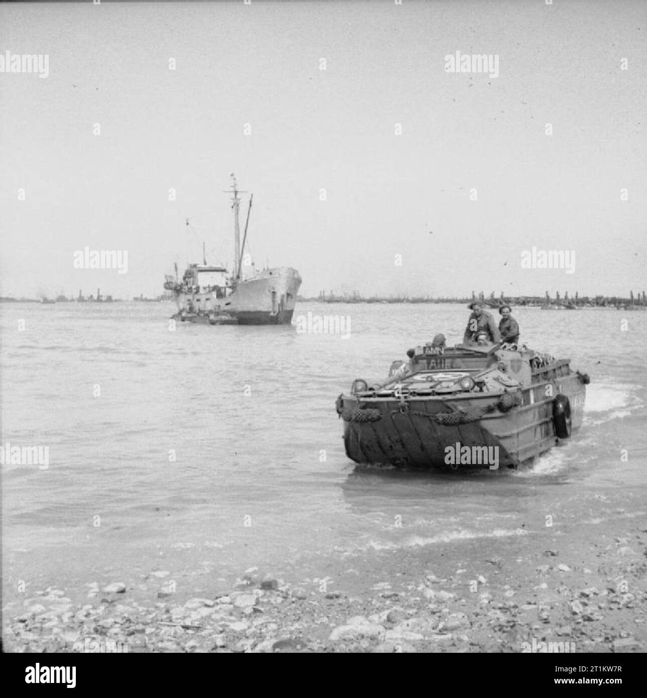 The British Army in Normandy 1944 A DUKW bringing ammunition ashore at ...