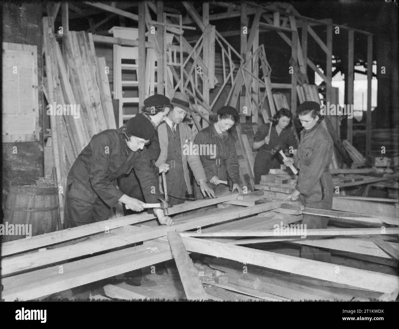 Women Carpenters Then and Now- Women at work in England, 1941 A male ...