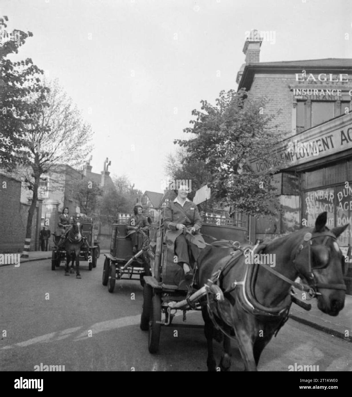 Women Deliver the Milk in Wartime Britain, 1942 Milk girls leave the ...
