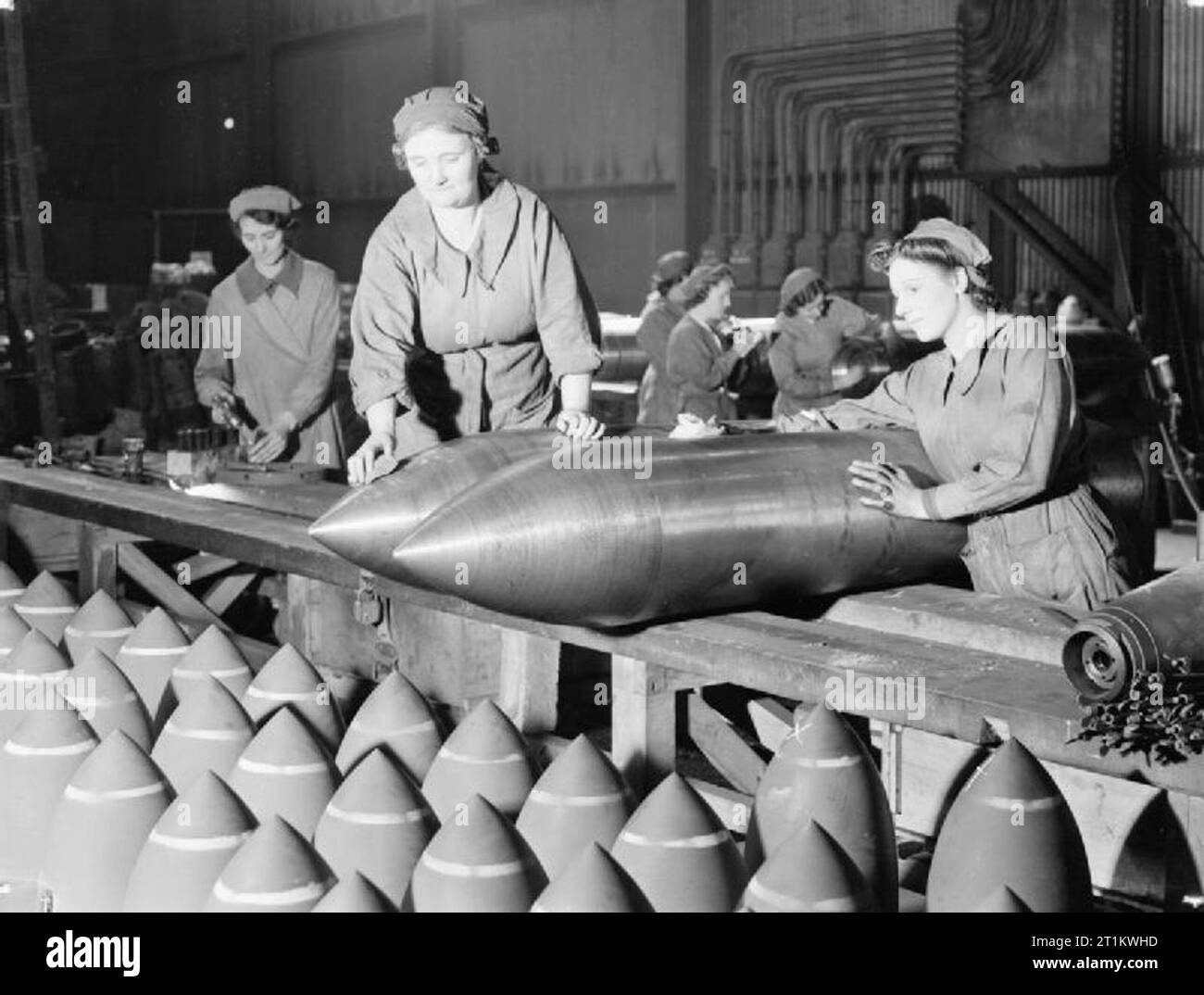 Women's War Work- Life in a Shell Factory, England, UK, 1942 Women add ...