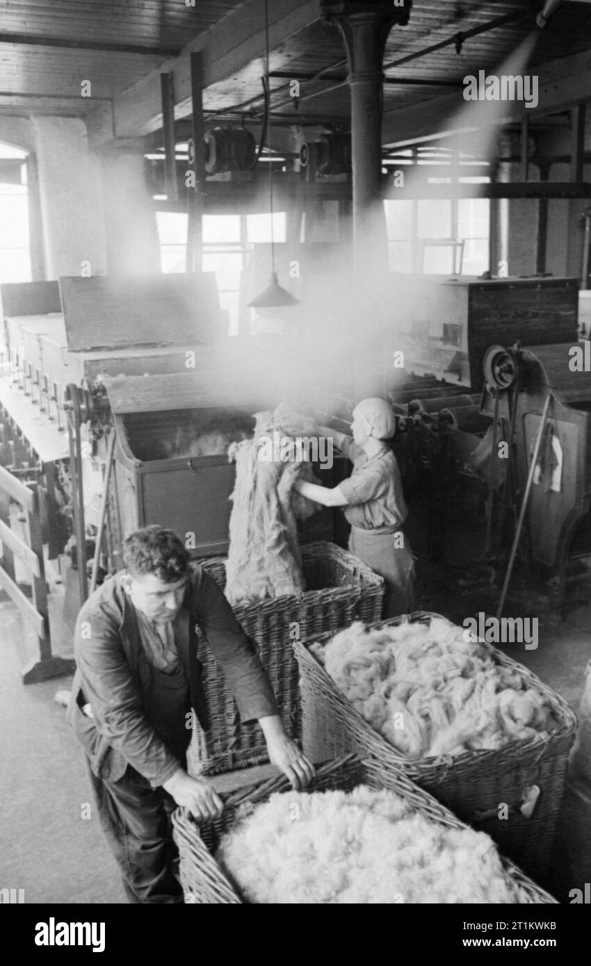 Workers at a British hat factory prepare rabbit fur ready for its ...