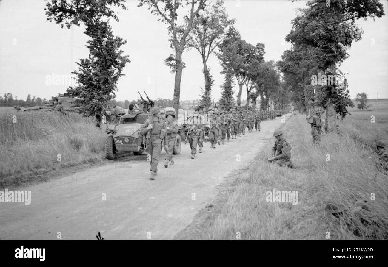 The British Army in Normandy 1944 Men of the 8th Royal Scots move ...