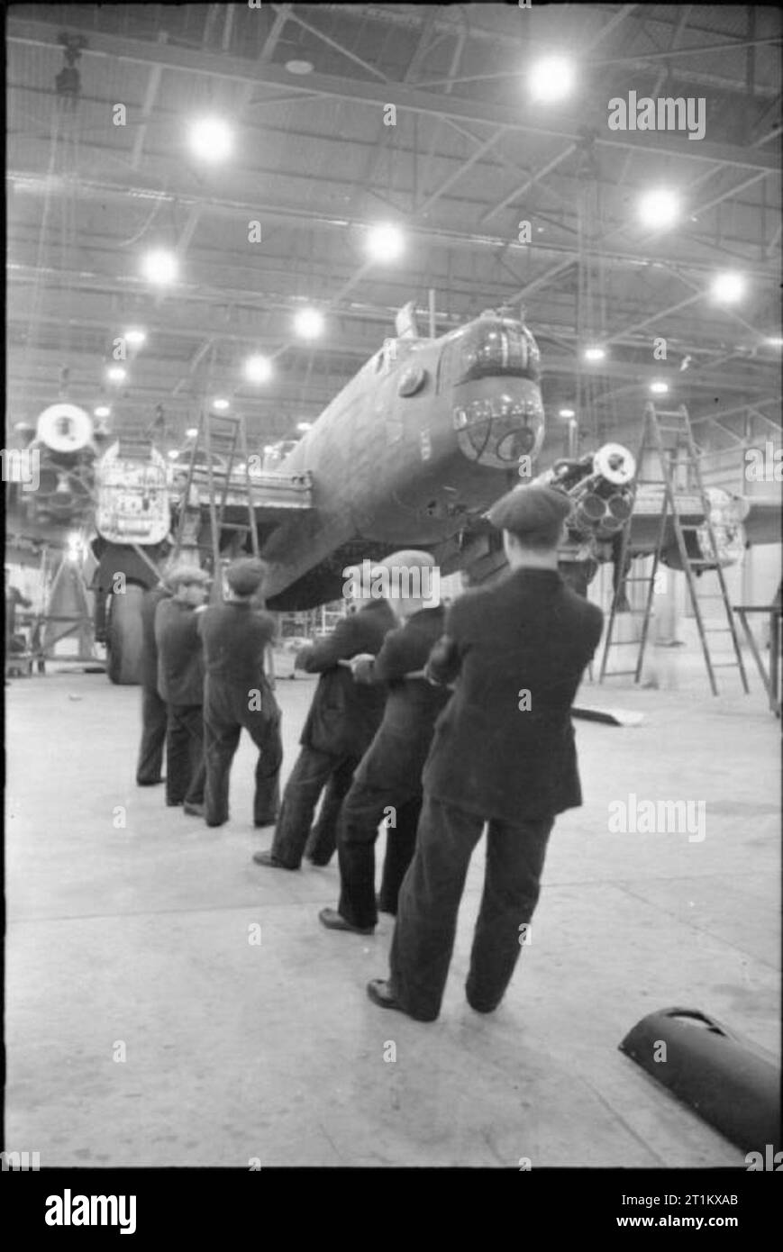 Birth of a Bomber- Aircraft Production in Britain, 1942 A team of men ...